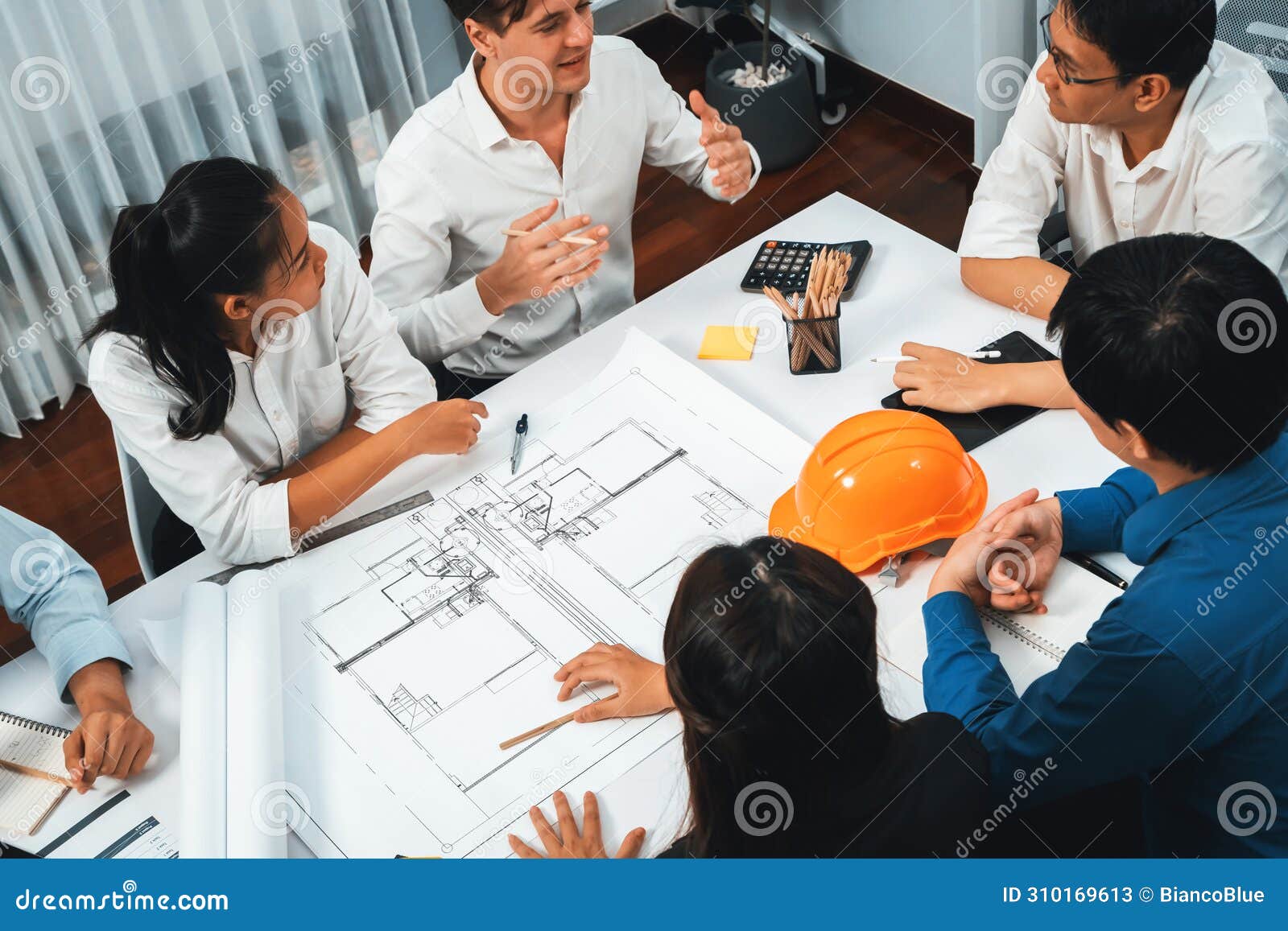 Diverse Group of Civil Engineer and Client Working on Architect ...