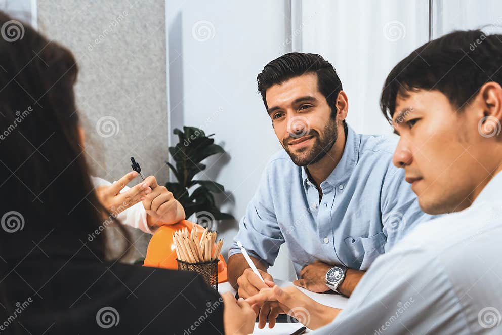 Diverse Group of Civil Engineer and Client Working on Architect ...