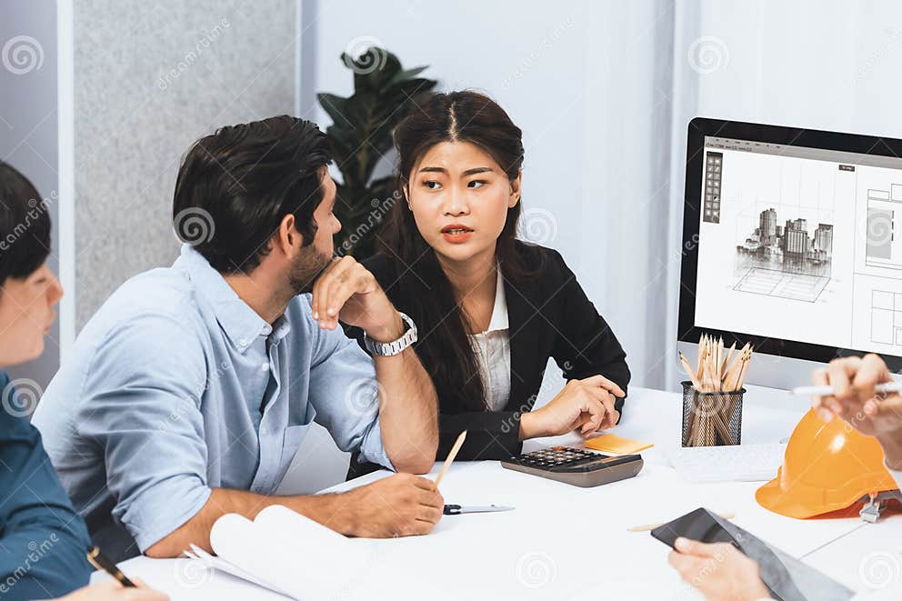 Diverse Group of Civil Engineer and Client Working on Architect ...