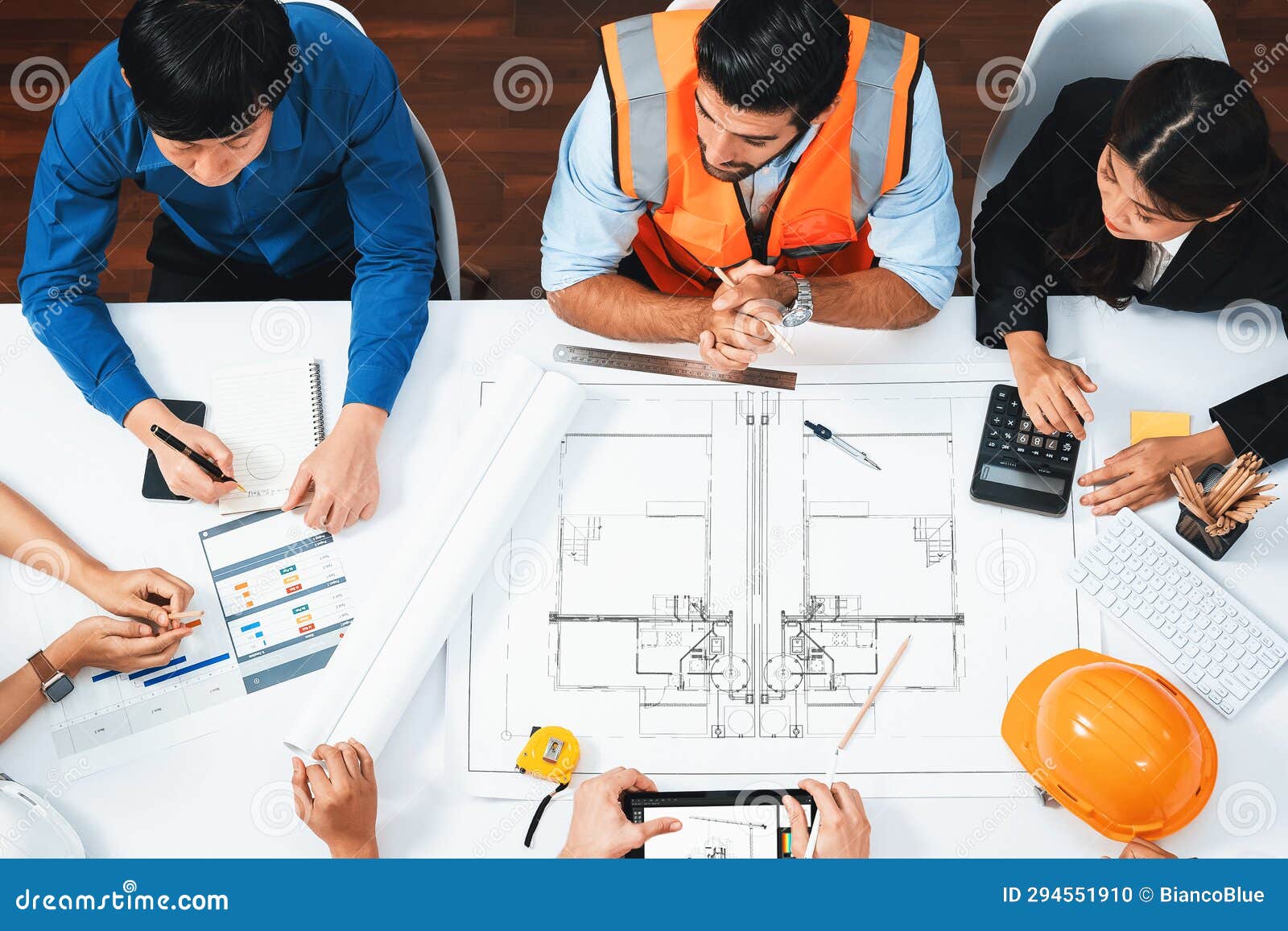 Diverse Group of Civil Engineer and Client Working on Architect ...