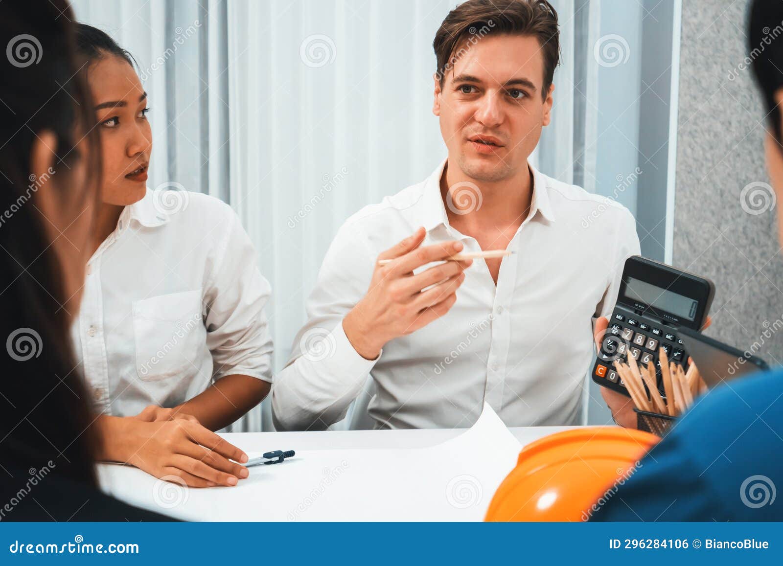 Diverse Group of Civil Engineer and Client Working on Architect ...