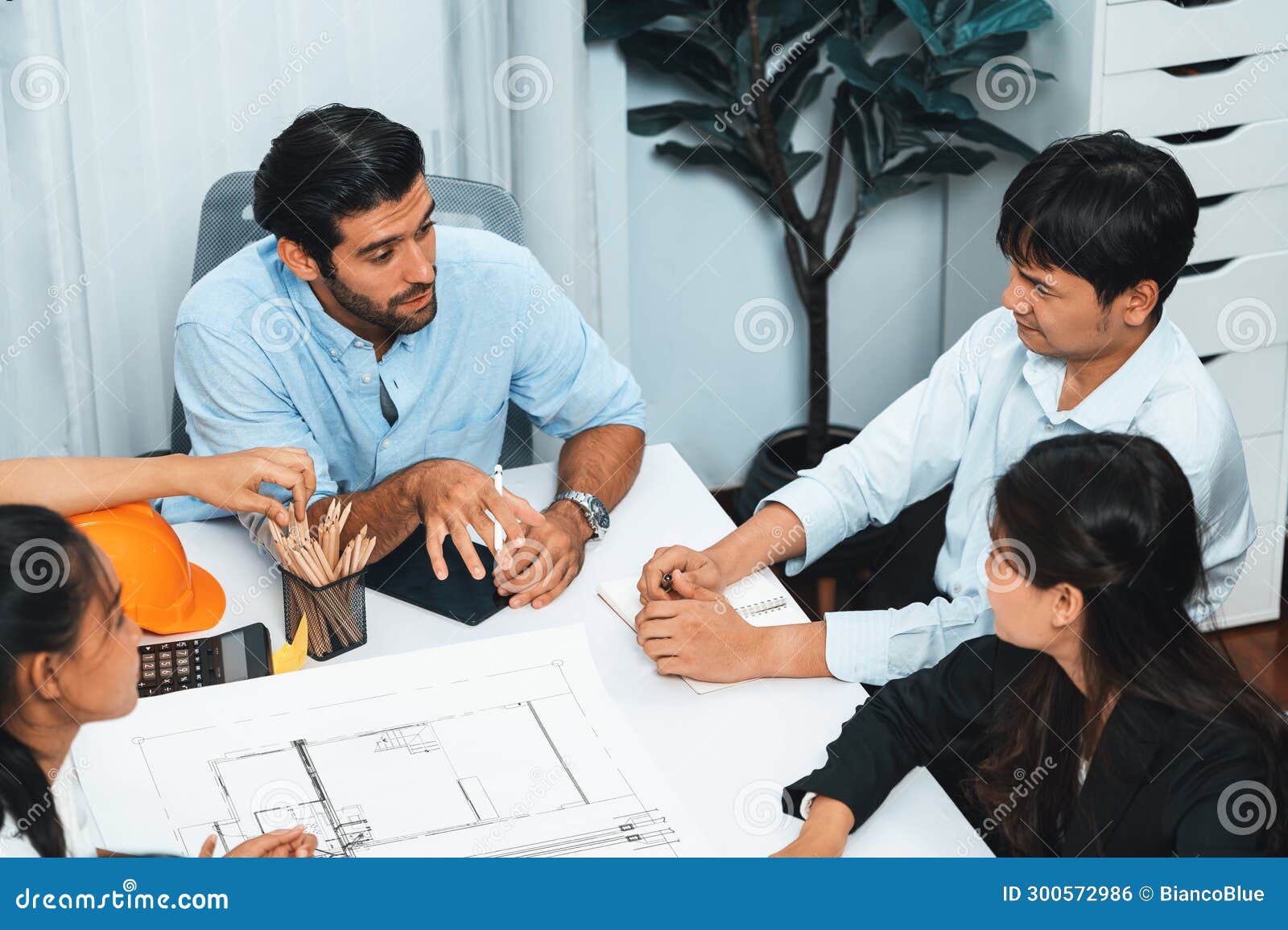 Diverse Group of Civil Engineer and Client Working on Architect ...