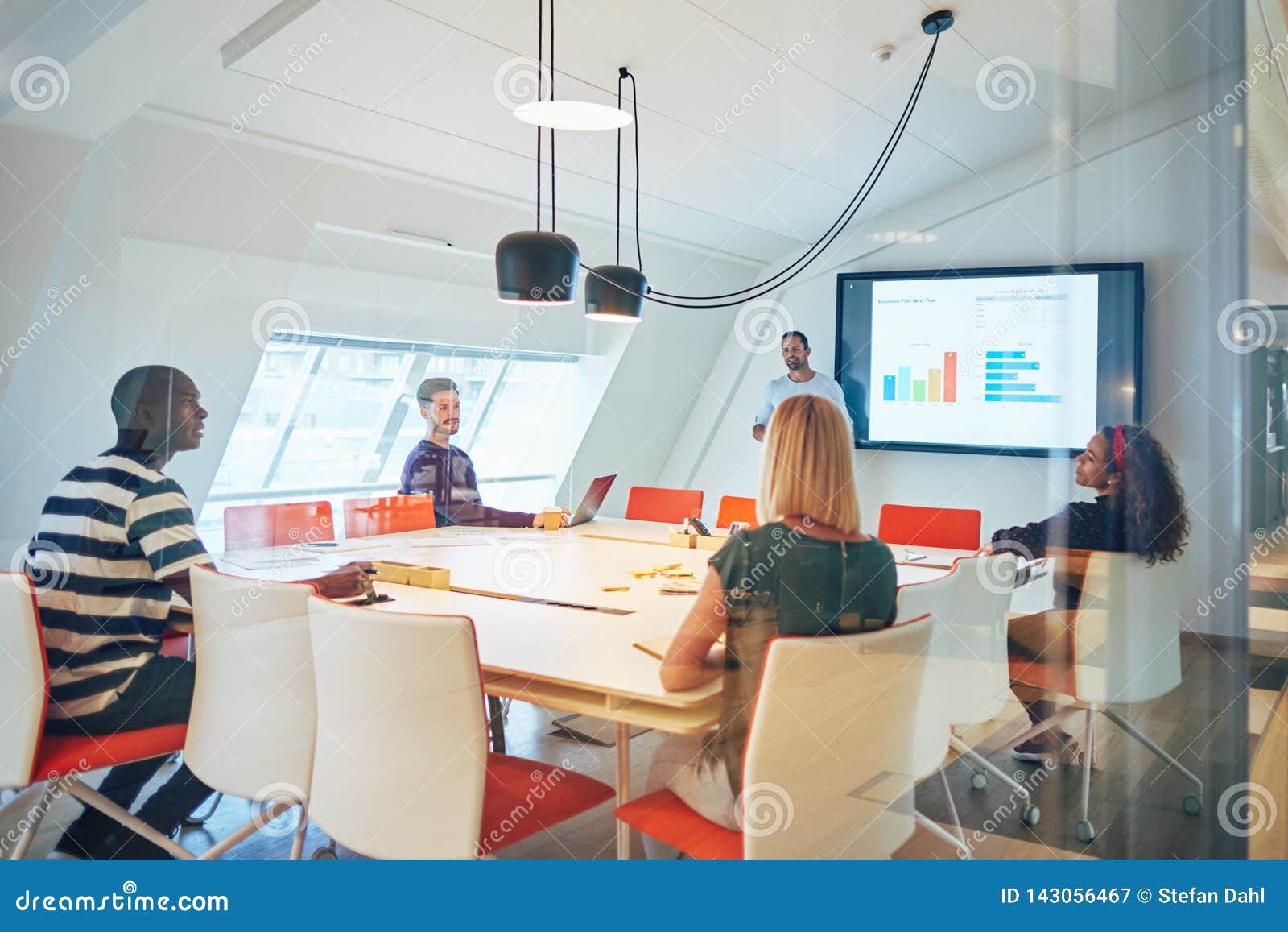 Diverse Group of Colleagues Talking Together during an Office Pr Stock ...