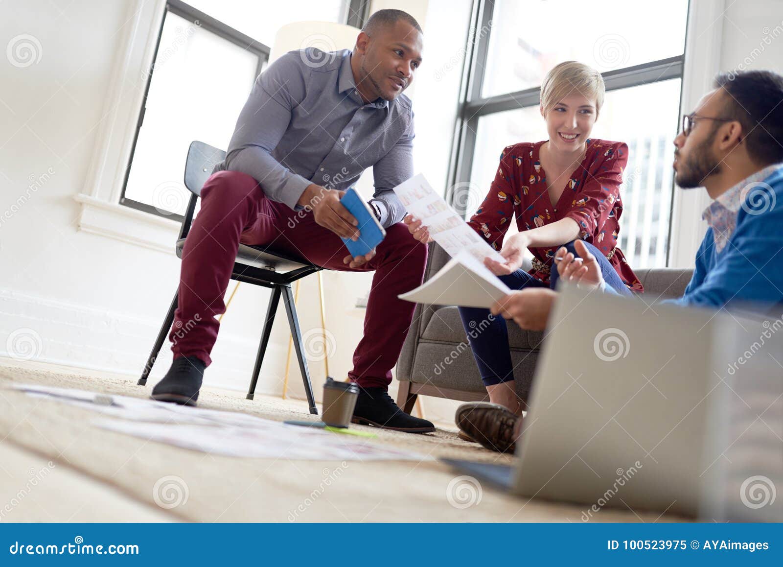 Multi-ethnic Team of Creative Millenials Collaborating on a Brainstorm ...