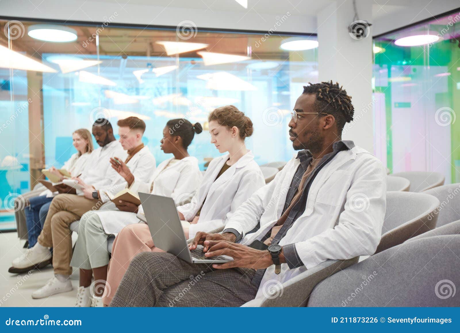 Diverse Group of Doctors at Seminar Stock Photo - Image of computer ...
