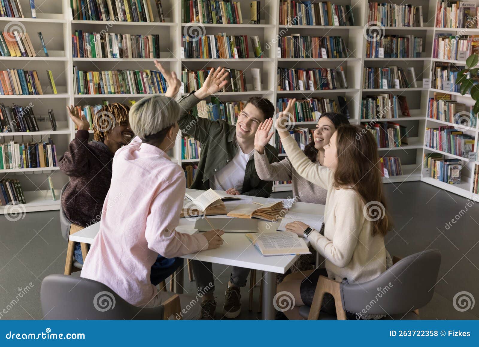 Diverse Group of Excited Students Enjoying Teamwork, Education Process ...