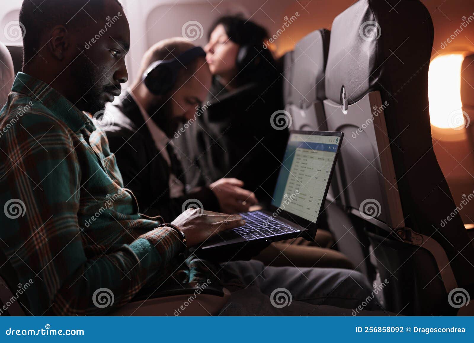 Diverse Group of Passengers Flying in Commercial Class Together Stock ...
