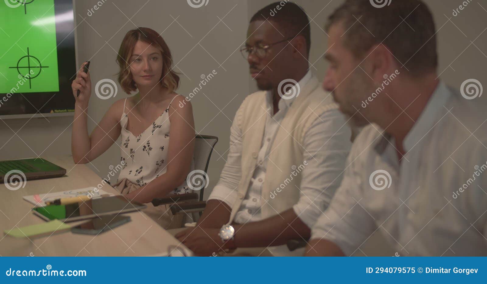 A Diverse Group of People is Collaboratively Working on a Project ...