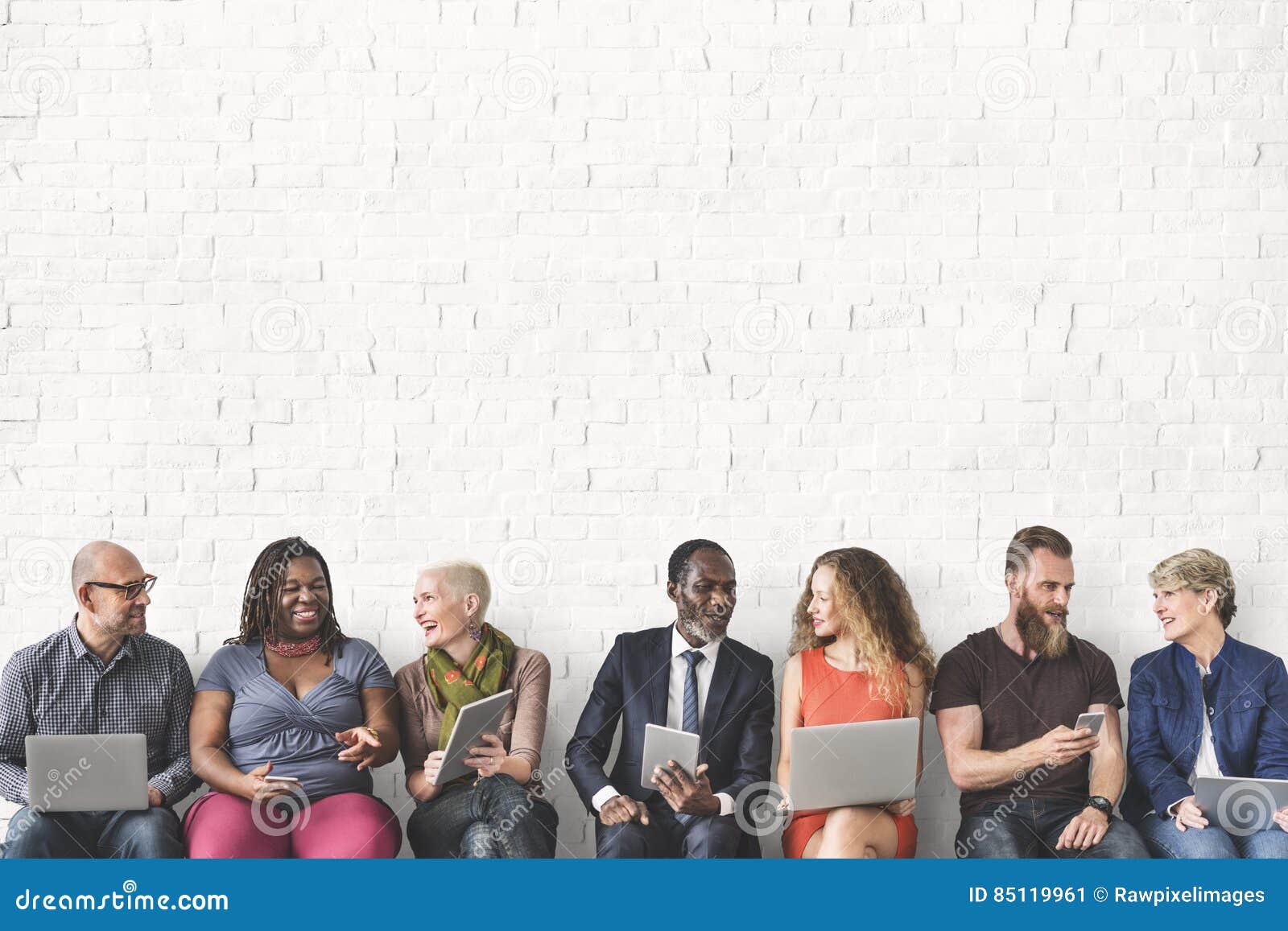 Diverse Group of People Community Togetherness Technology Sitting ...