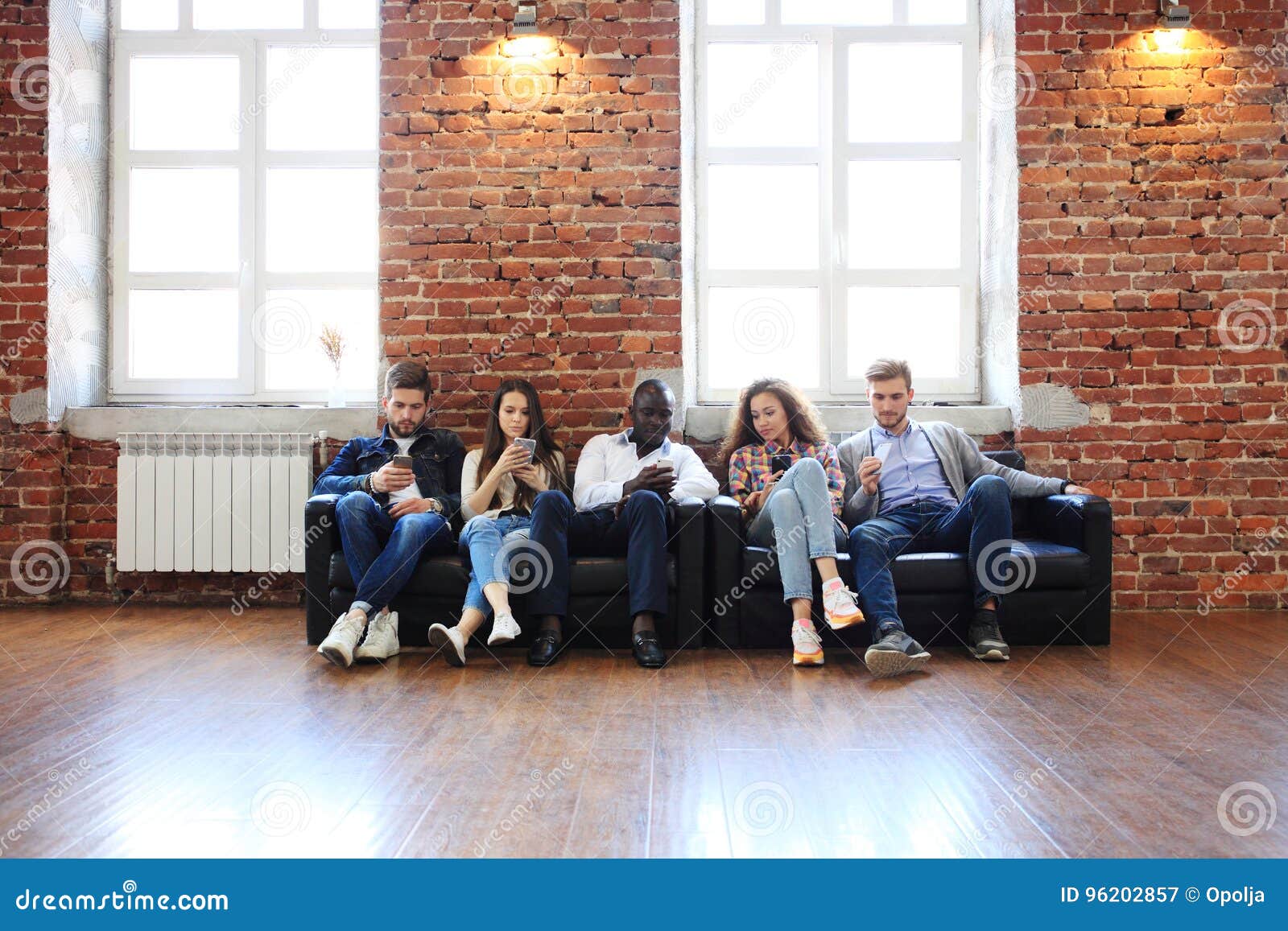 Diverse Group of People Community Togetherness Technology Sitting ...