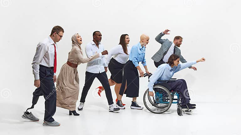 Diverse Group of Professionals in Motion, Moving Forward, Dynamic Team ...