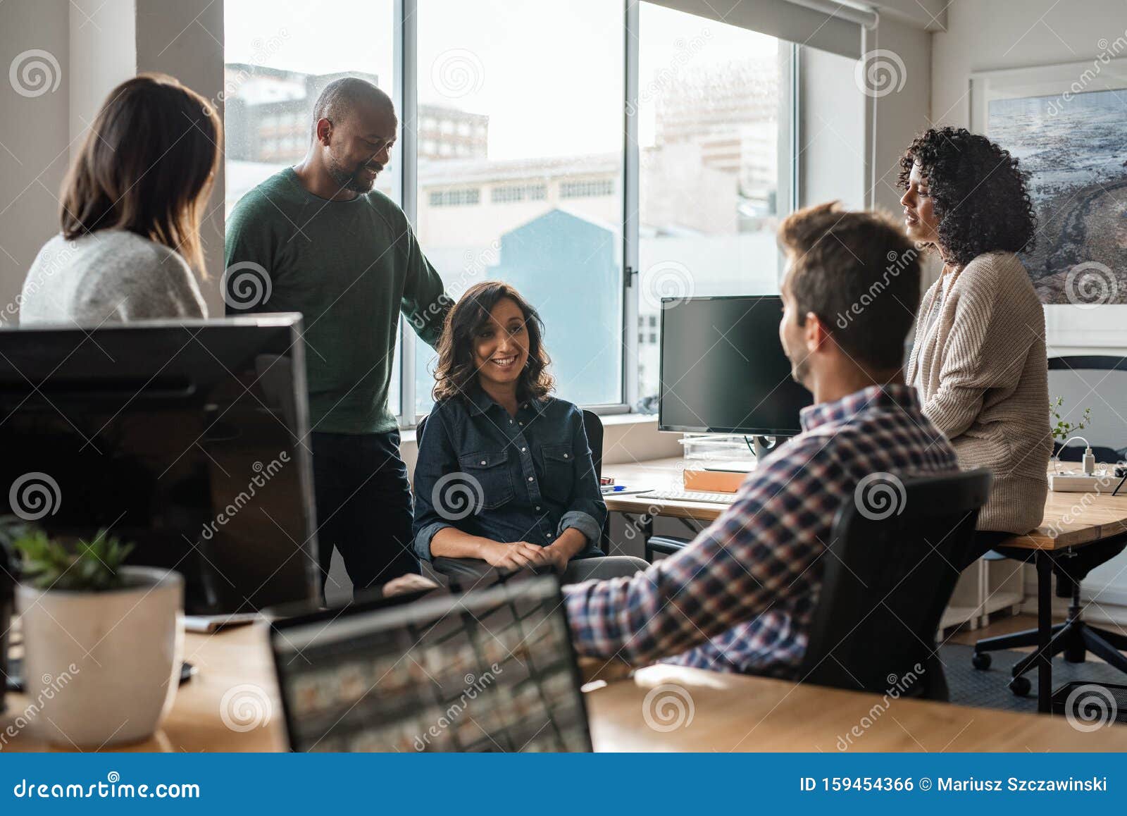 Diverse Group of Smiling Designers Meeting Together in an Office Stock ... Diverse Group of Smiling Designers Meeting Together in an Office Stock ...