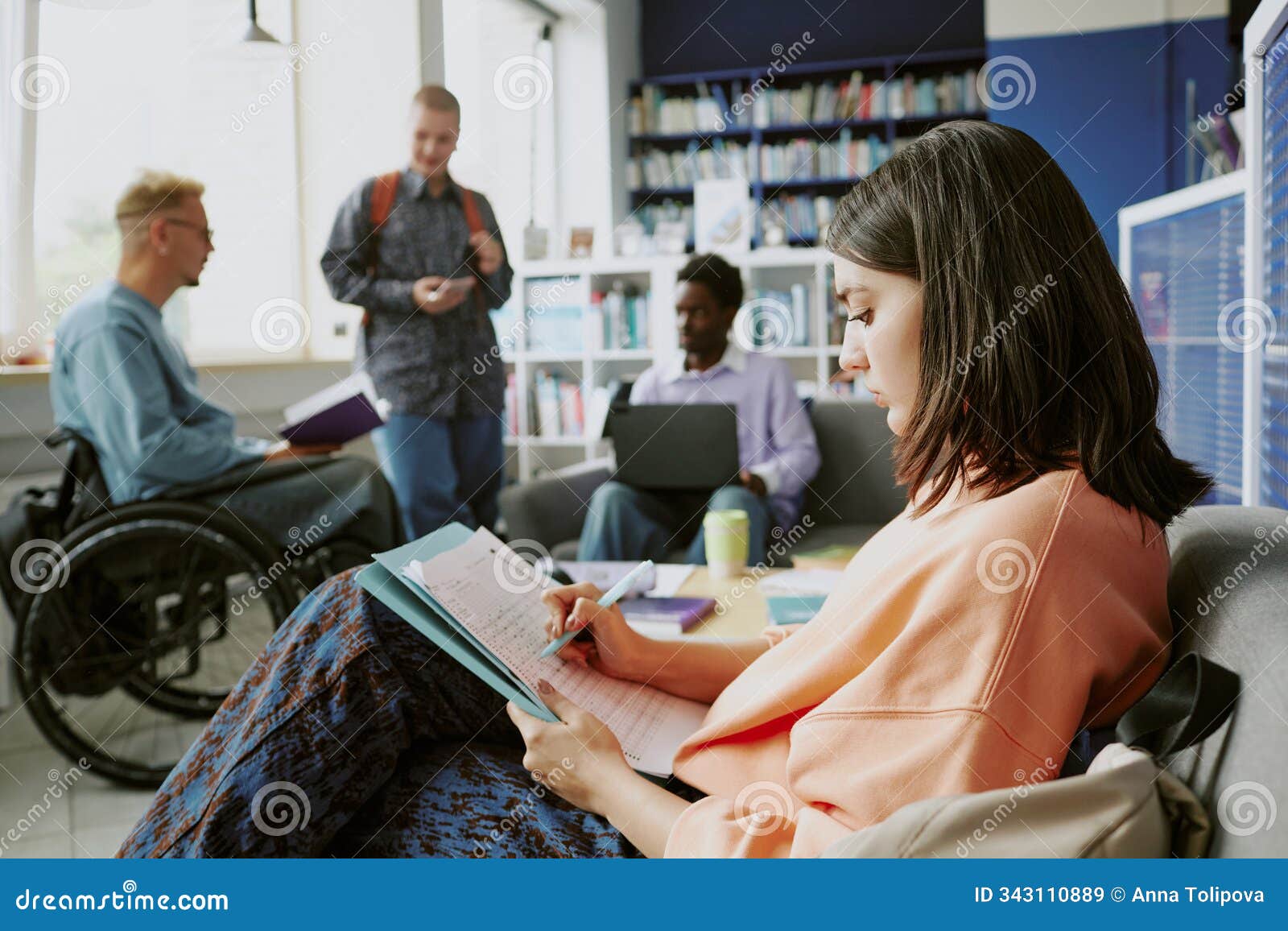 Diverse Group of Students Studying and Socializing Together Stock Image ...