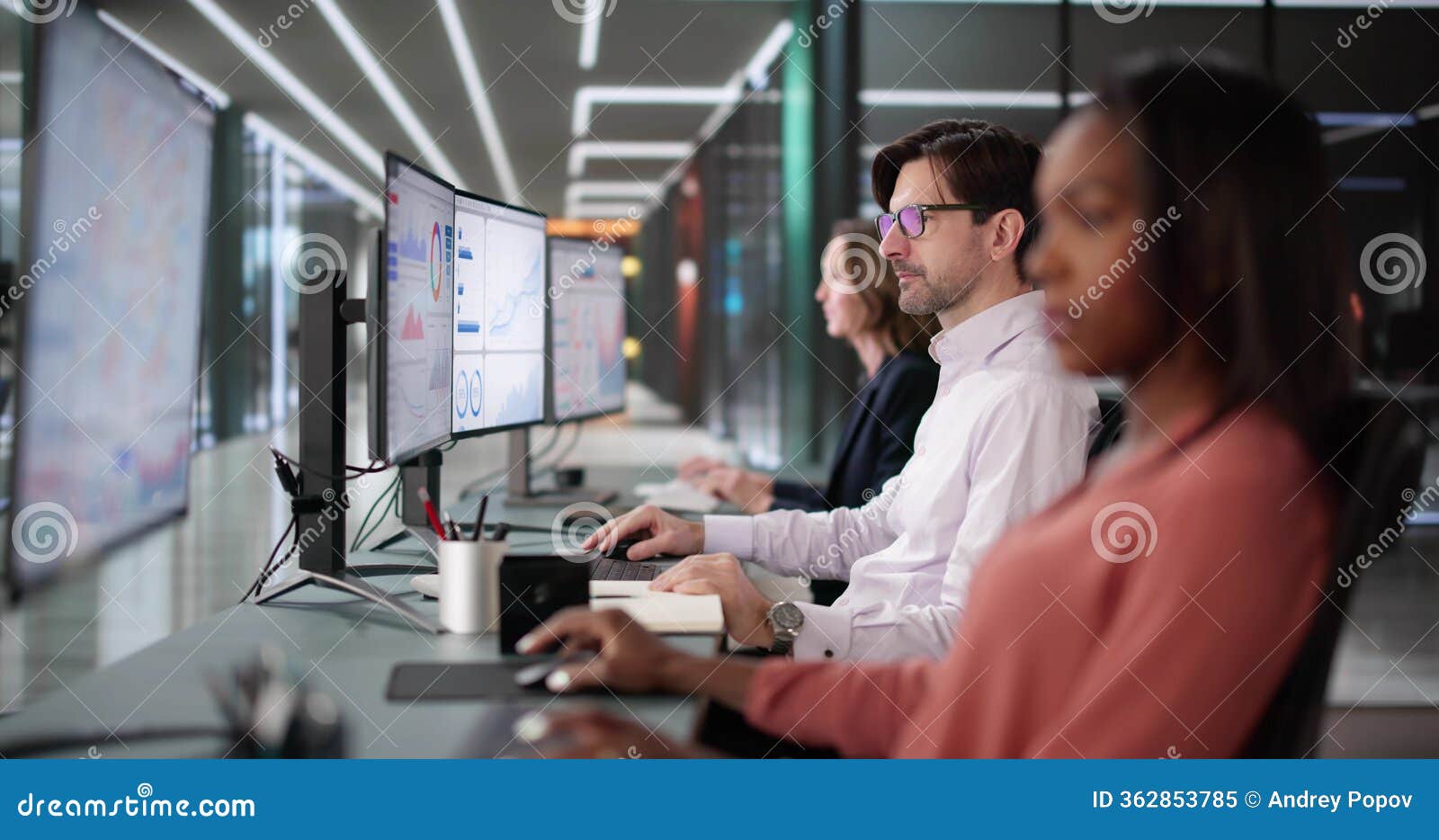 Diverse Group of Students and Teachers Analyzing Business Analytics ...