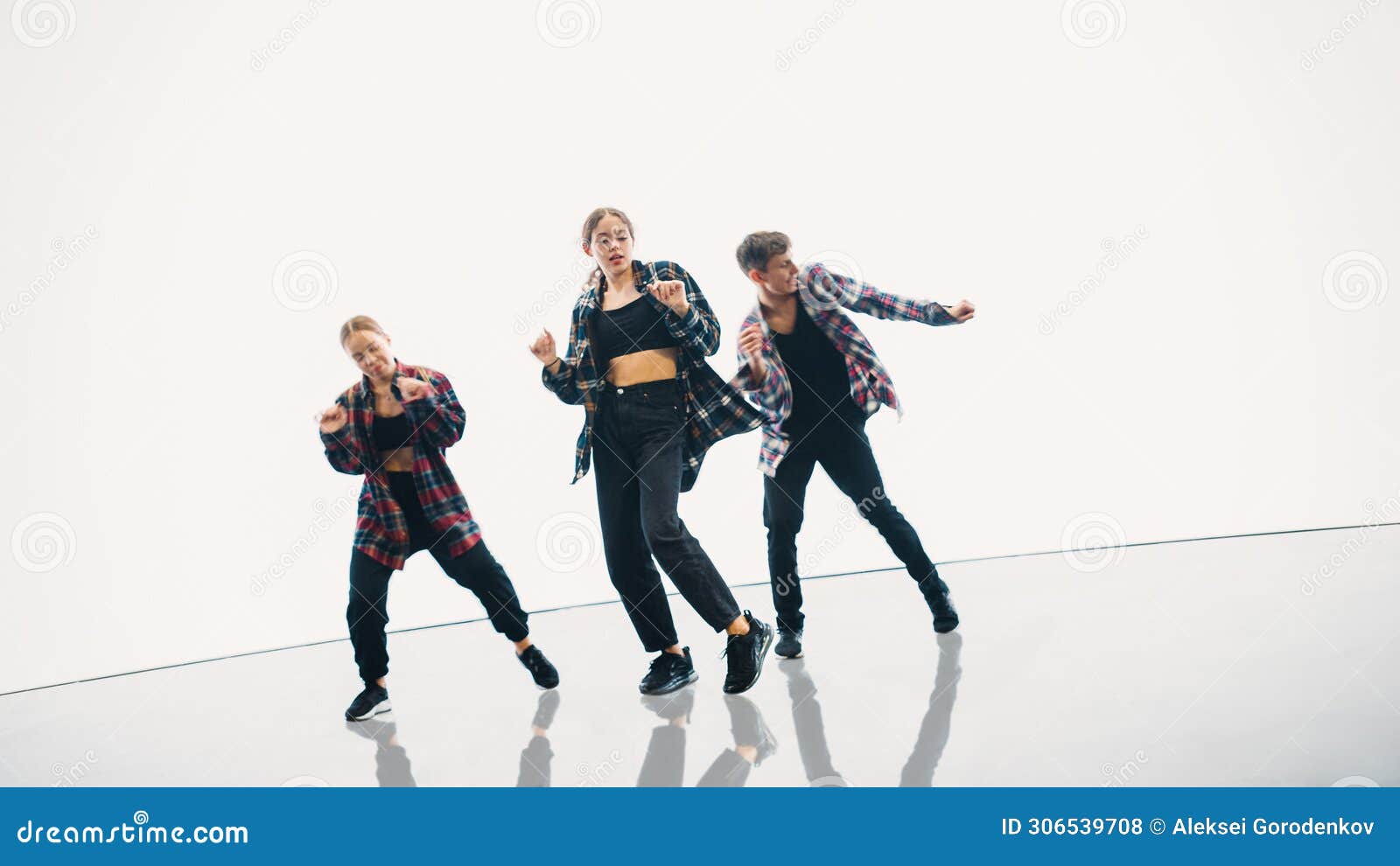 Diverse Group of Three Professional Dancers Performing a Hip Hop Dance ...