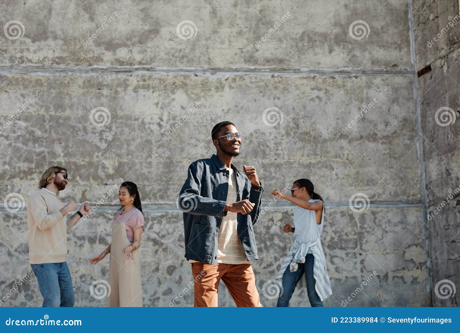 Diverse Group of Young People Dancing Outdoors Stock Photo - Image of ...