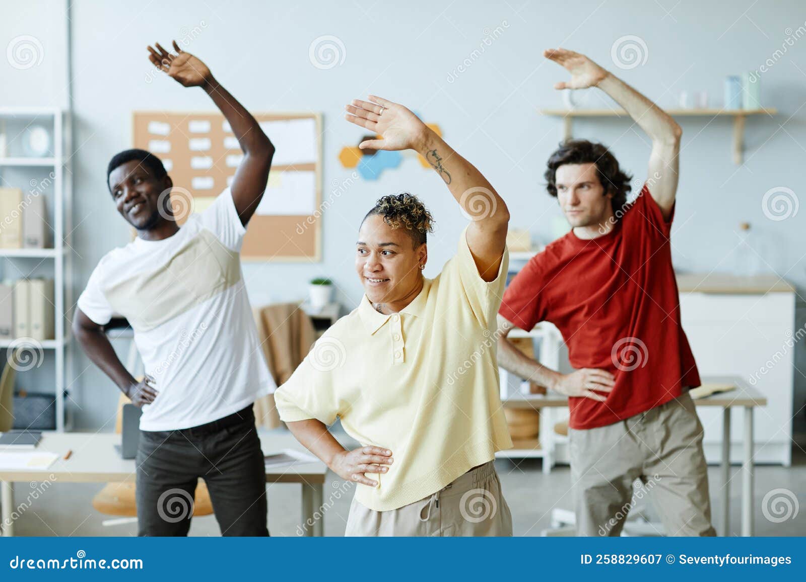 Group Exercises in Office stock image. Image of activity - 258829607