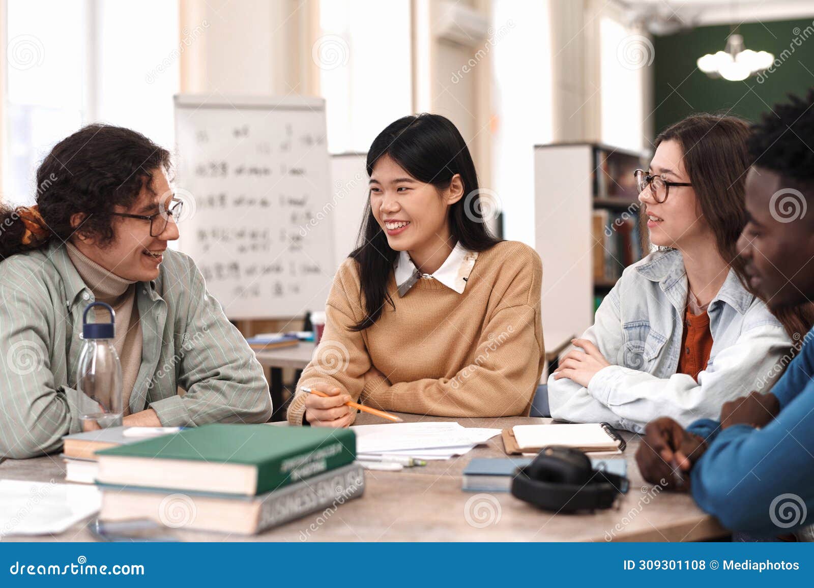 Diverse Group of Young People Studying at Table Stock Photo - Image of ...
