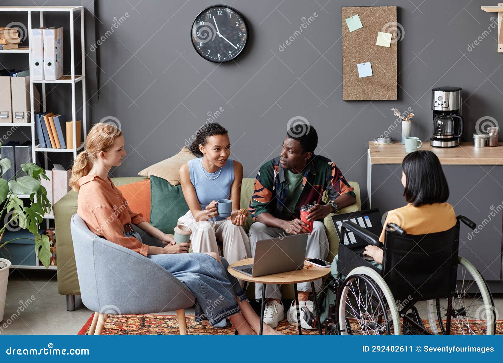 Diverse Group of Young Professionals Meeting in Office Lounge Stock ...
