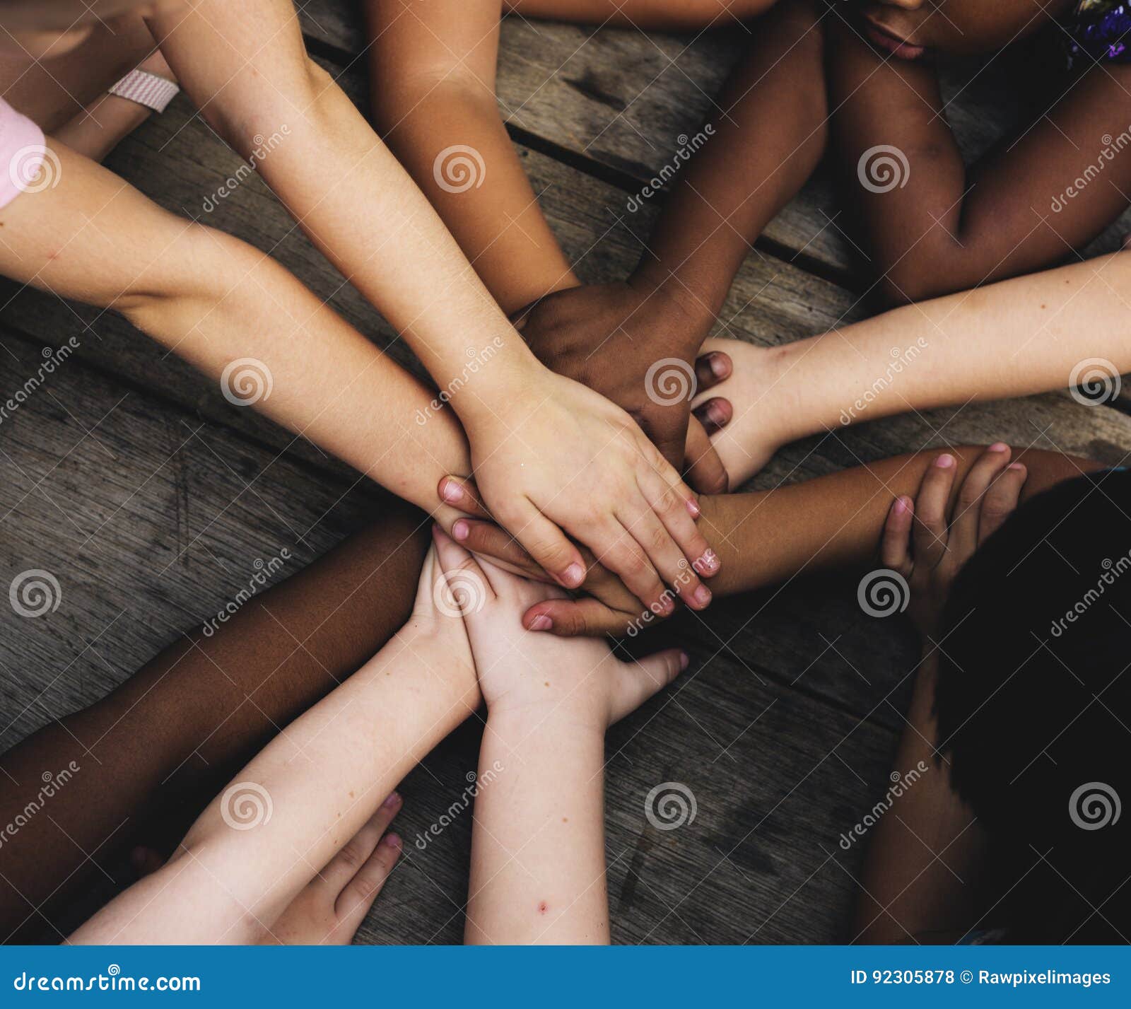 Diverse Hands are Join Together on the Wooden Table Stock Photo - Image ...