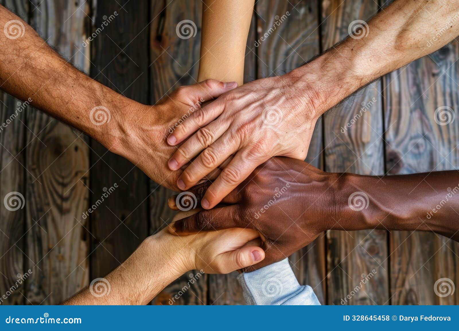 Diverse Hands Joined Together in Unity and Teamwork Stock Photo - Image ...