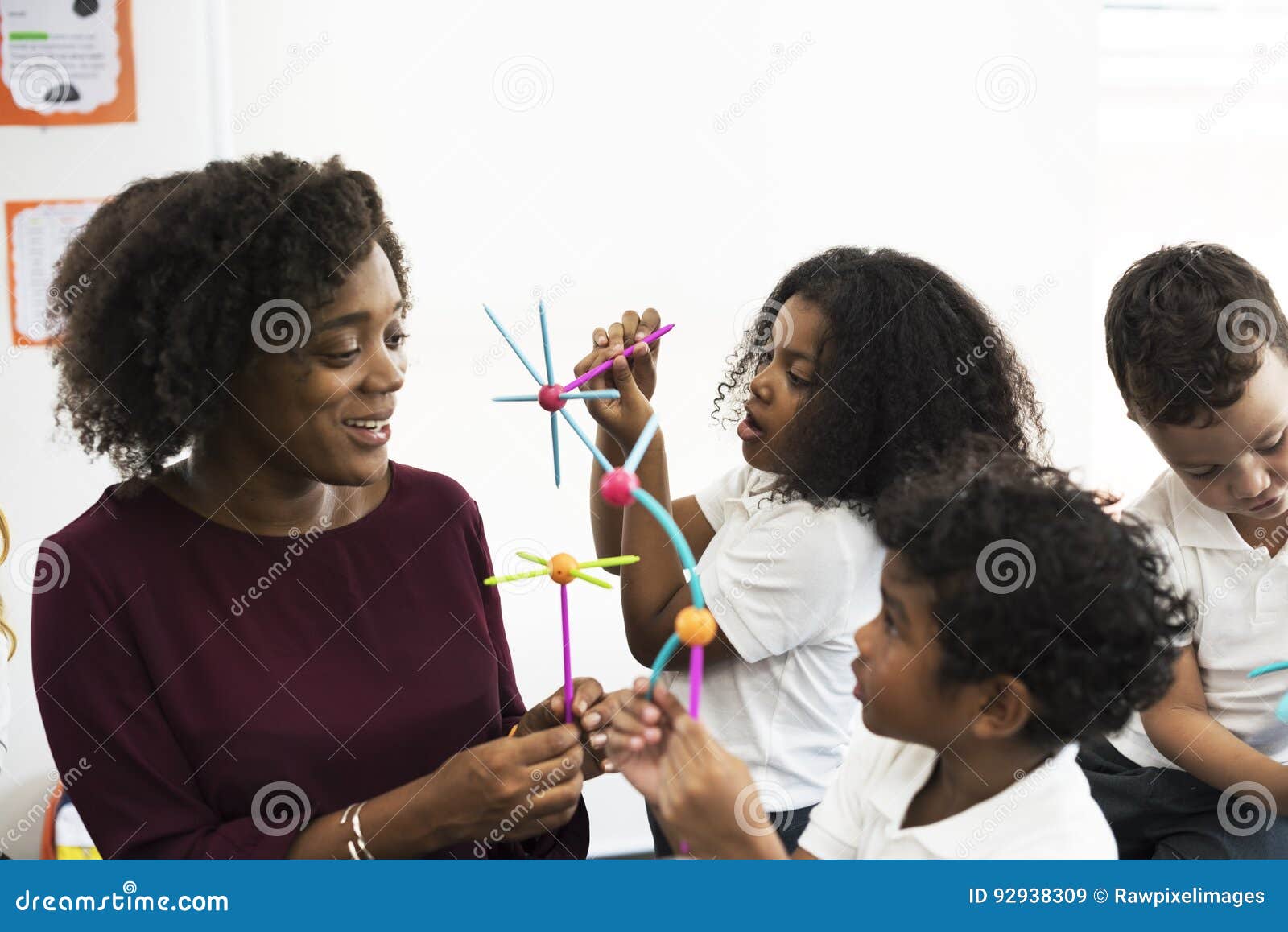Diverse Kindergarten Students Holding Learning Structures from T Stock ...
