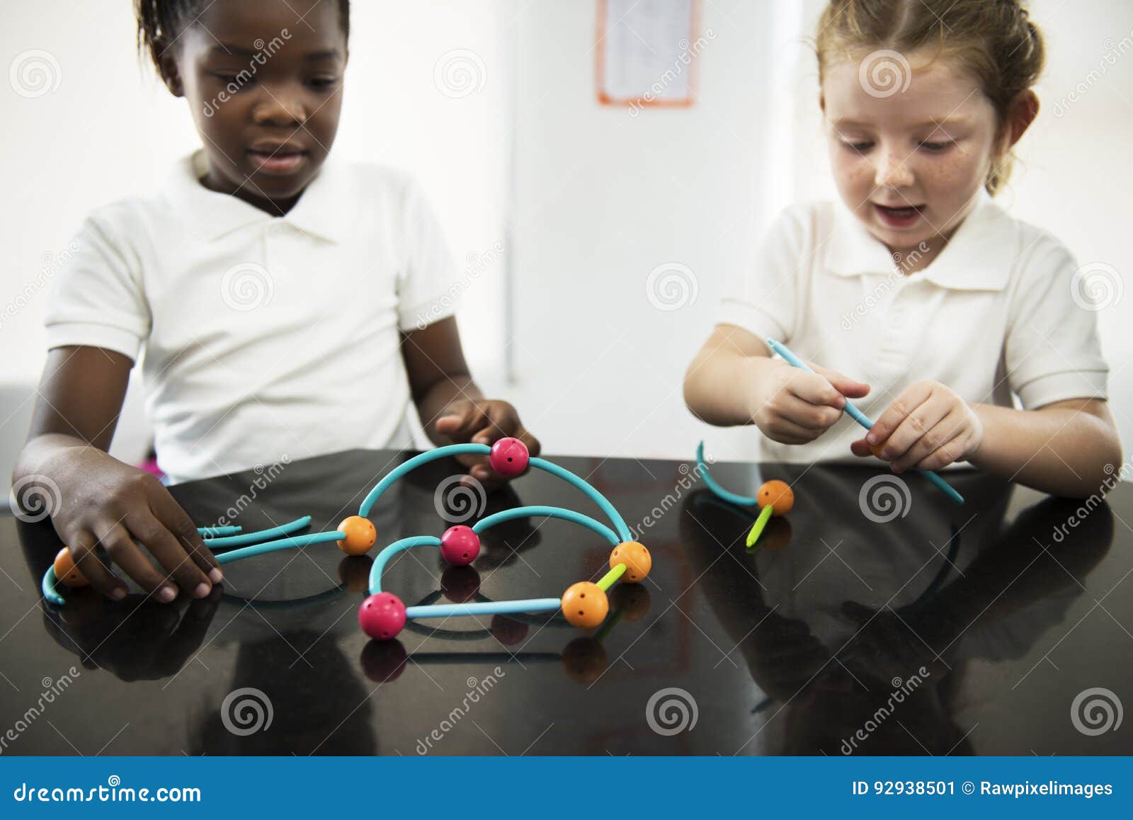 Diverse Kindergarten Students Holding Learning Structures from T Stock ...
