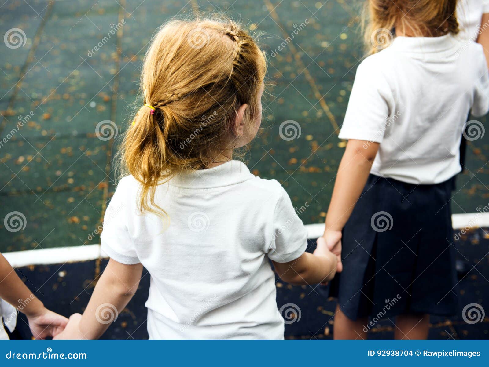 Diverse Kindergarten Students Standing Holding Hands Together Stock ...