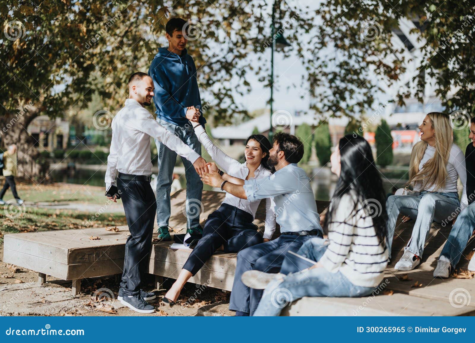 Diverse Learners Collaborate on a University Project in a Park ...