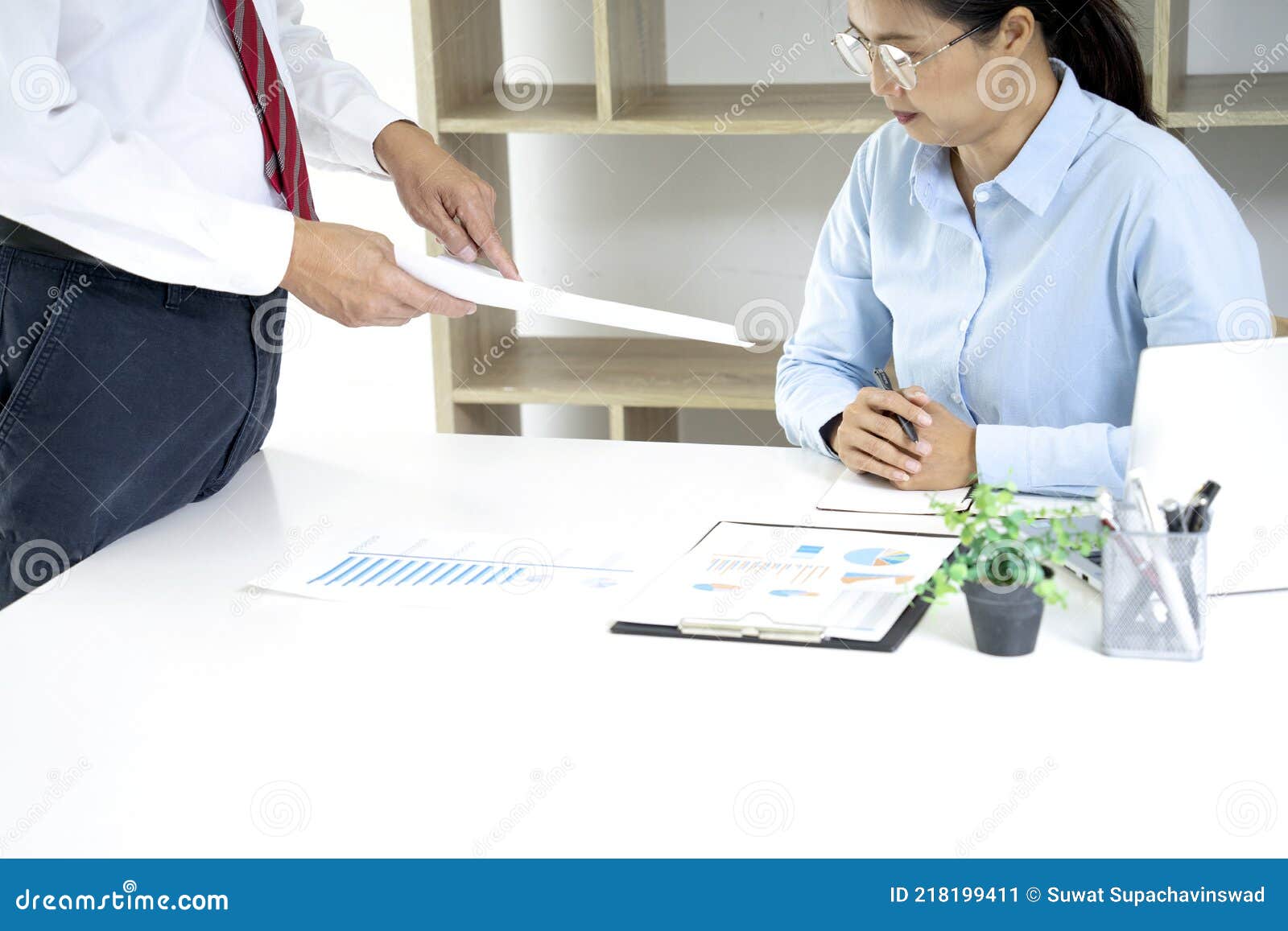 Diverse Male Mentor and Intern Talking Pointing on Paper Stock Image ...
