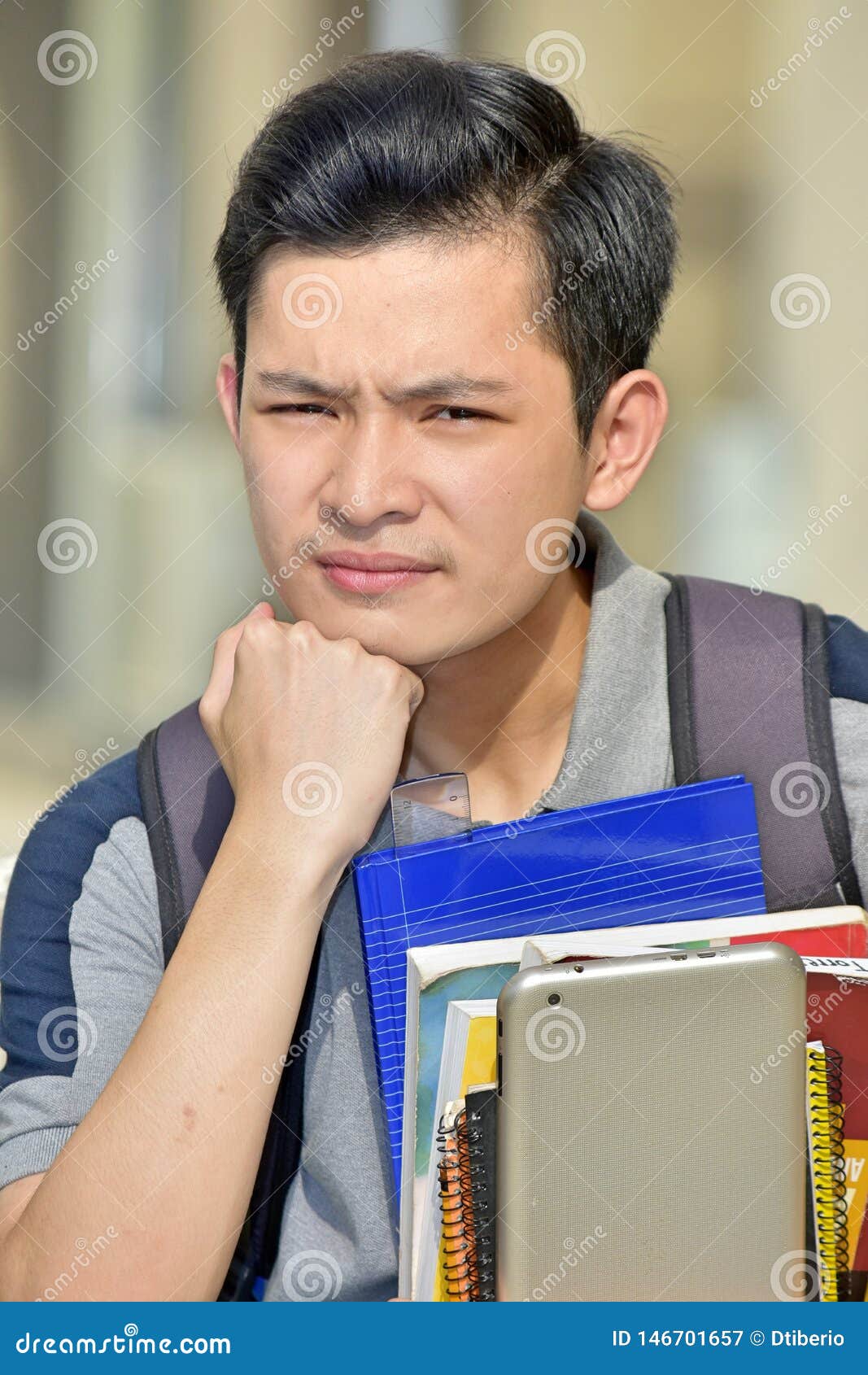 Diverse Male Student Thinking with Notebooks Stock Image - Image of ...