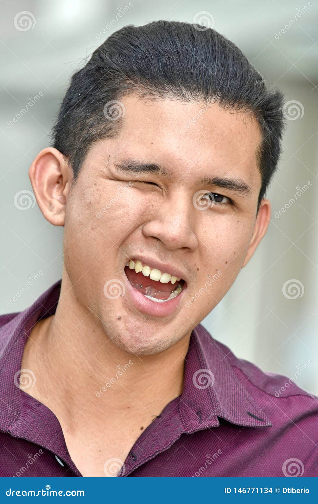 A Diverse Male Winking stock photo. Image of diverse - 146771134