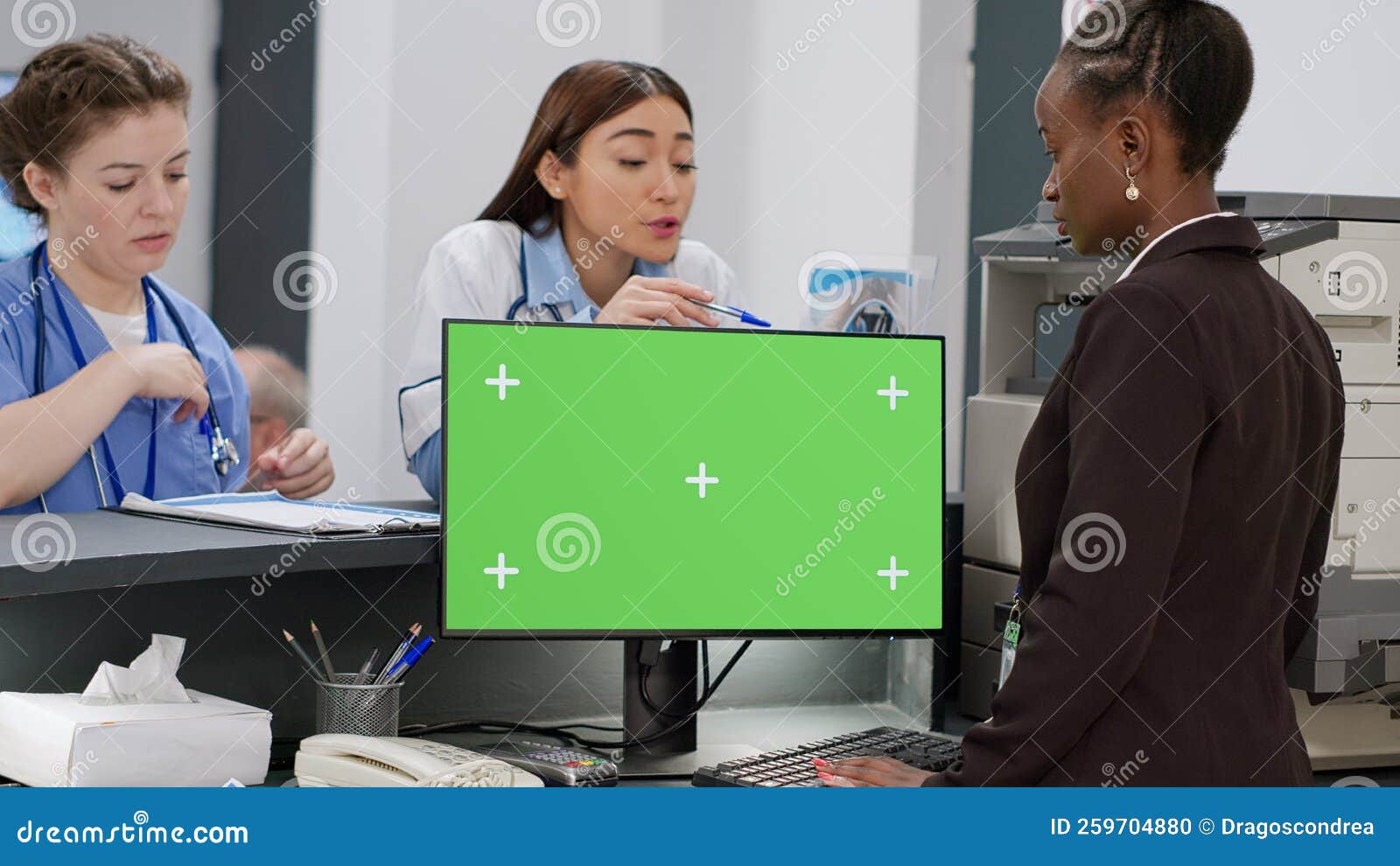 Diverse Medical Staff Working with Greenscreen on Computer Stock Photo ...