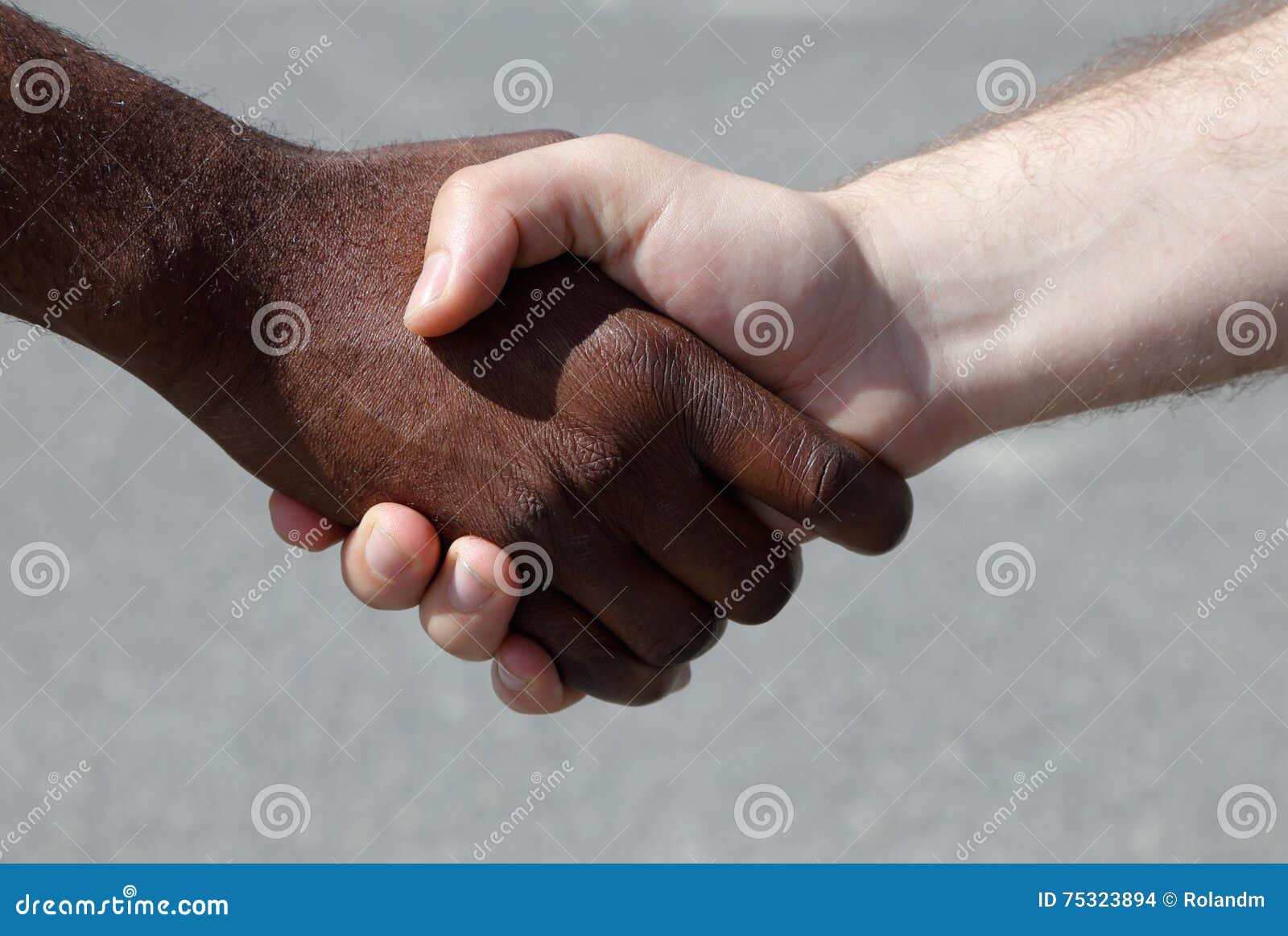 Diverse men shaking hands stock photo. Image of relations - 75323894