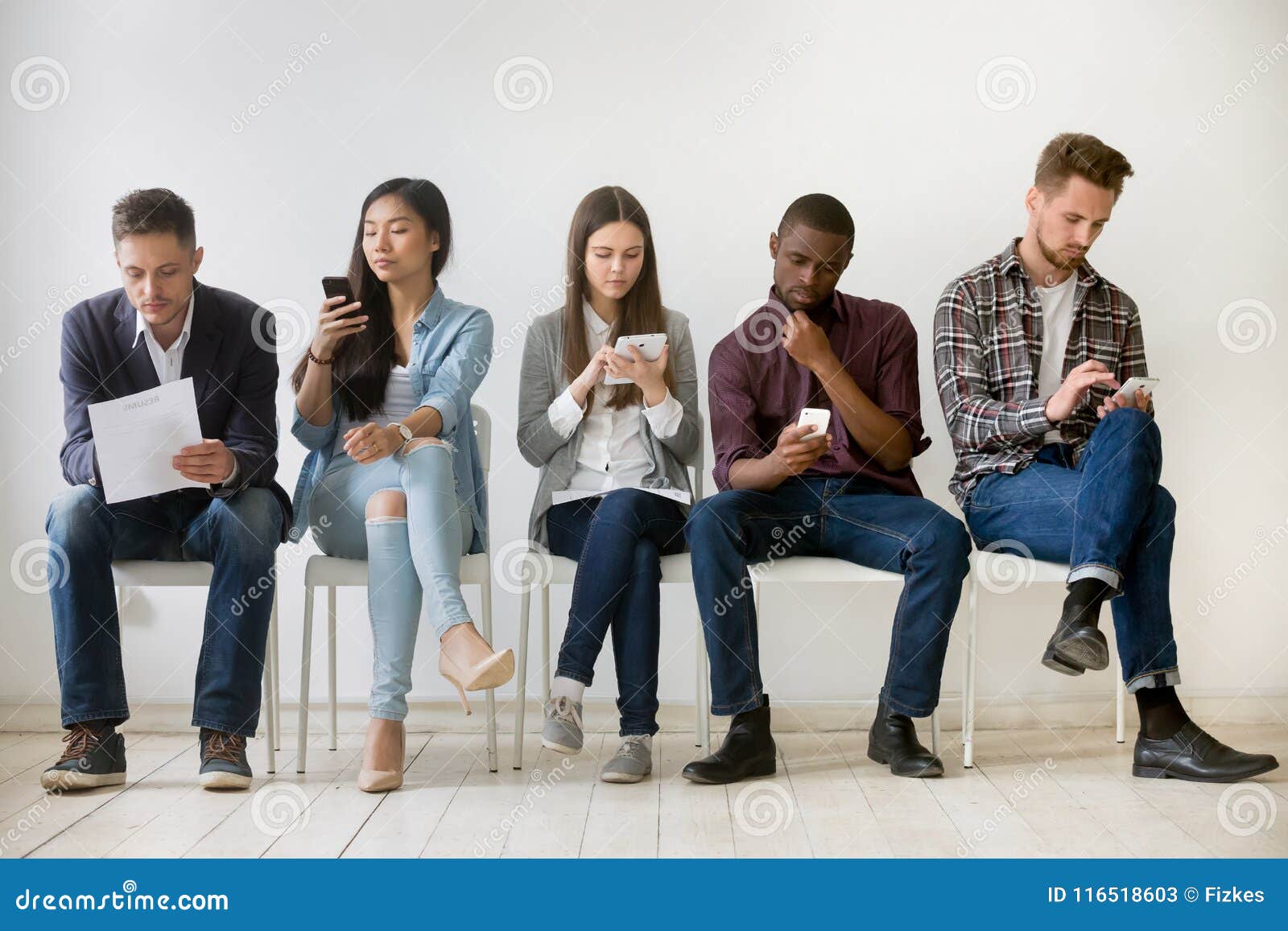 Diverse Millennial People Waiting in Queue Holding Resumes Using Stock ...