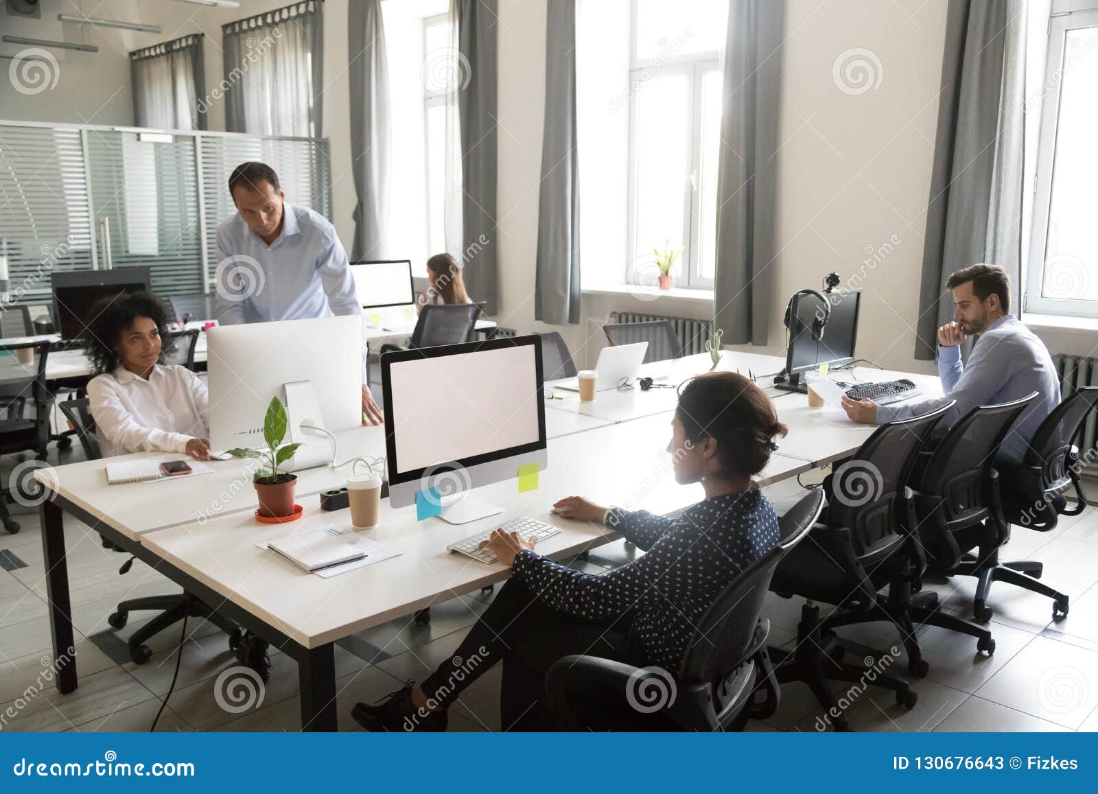 Diverse Multi-ethnic People Employees Working Together in Shared Stock ...