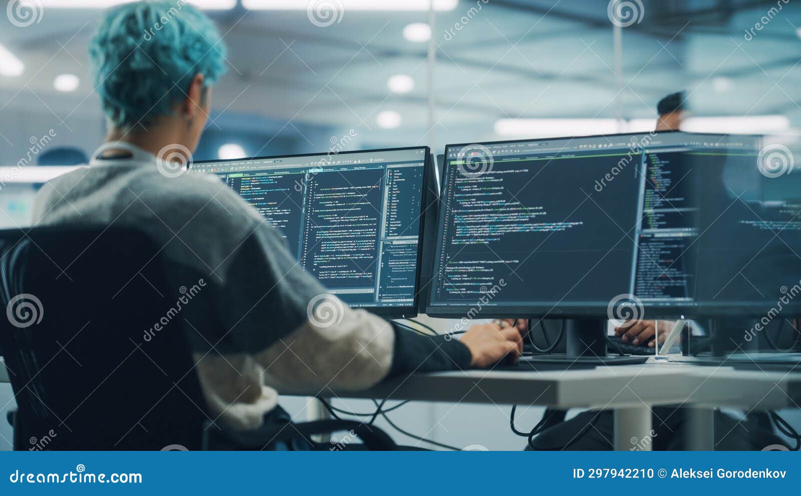 In Diverse Office: Female Programmer is Working on Desktop Computer ...