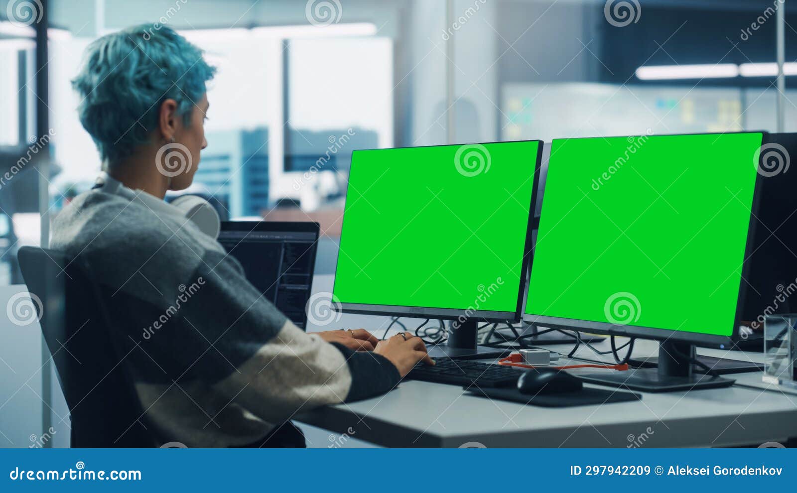 In Diverse Office: Female Programmer is Working on Green Screen Computer, Chroma Key and Coding ...