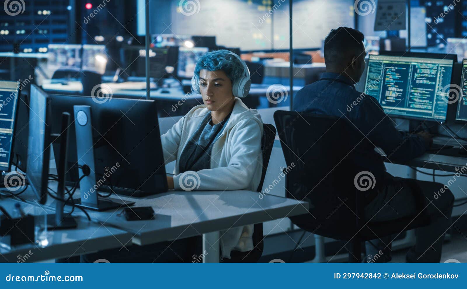 Diverse Office at Night: Multi-Ethnic Team of Young Programmers Working ... Diverse Office at Night: Multi-Ethnic Team of Young Programmers Working ...