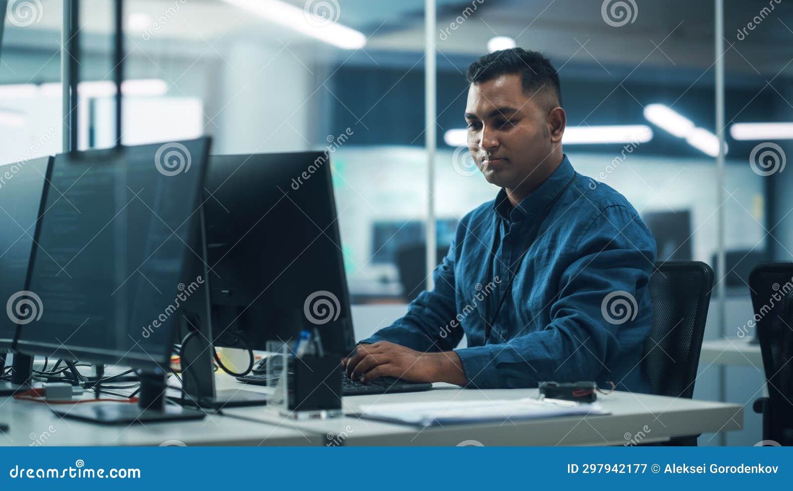 In Diverse Office: Portrait of Handsome Indian Man Working on Desktop ...