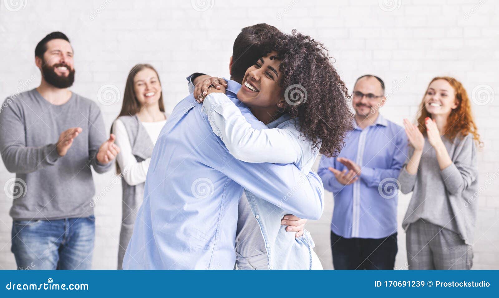 Diverse People Hugging after Successful Workshop or Seminar Stock Image ...