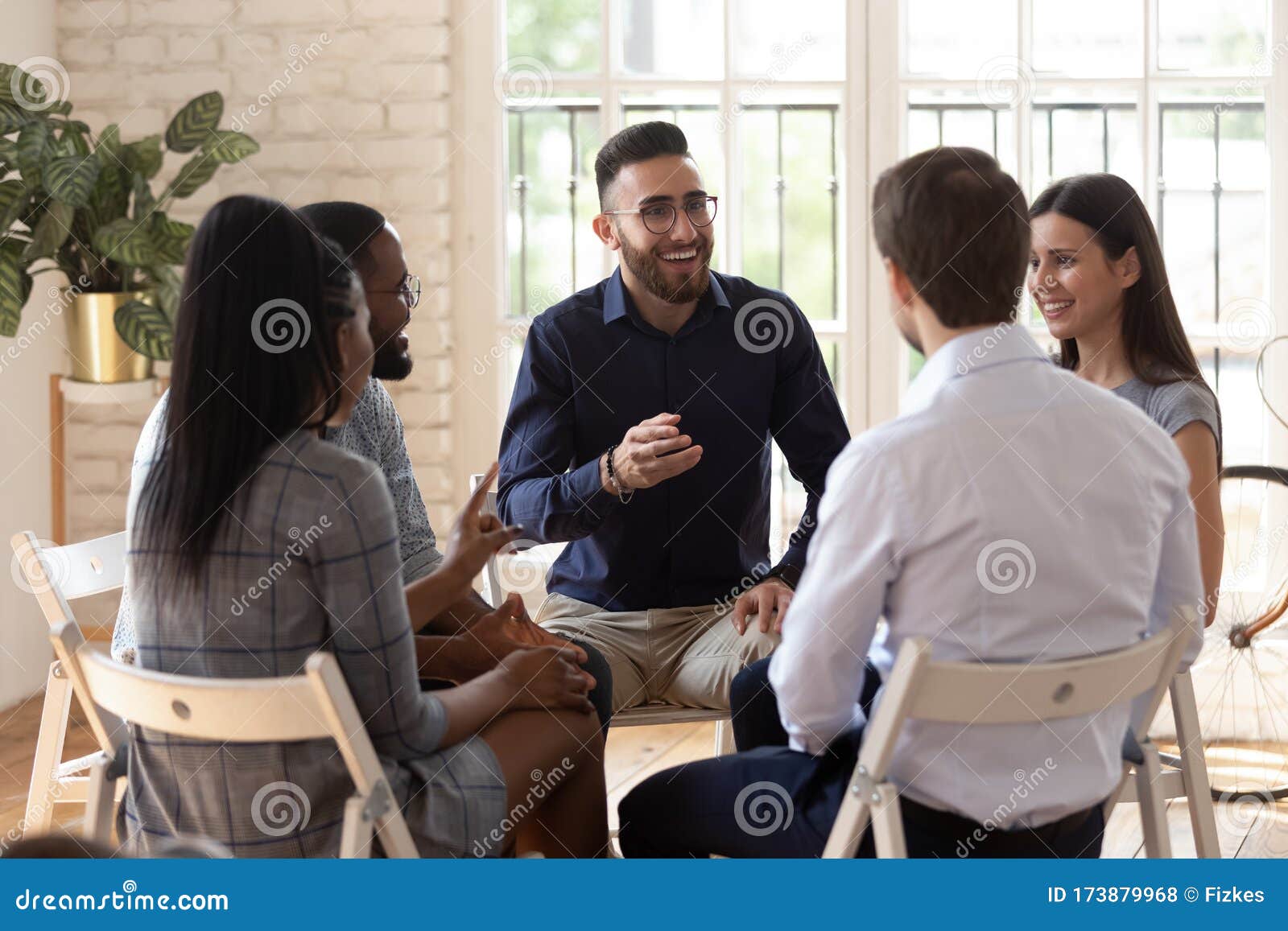 Diverse People Sit in Circle Participating in Team Building Activity ...