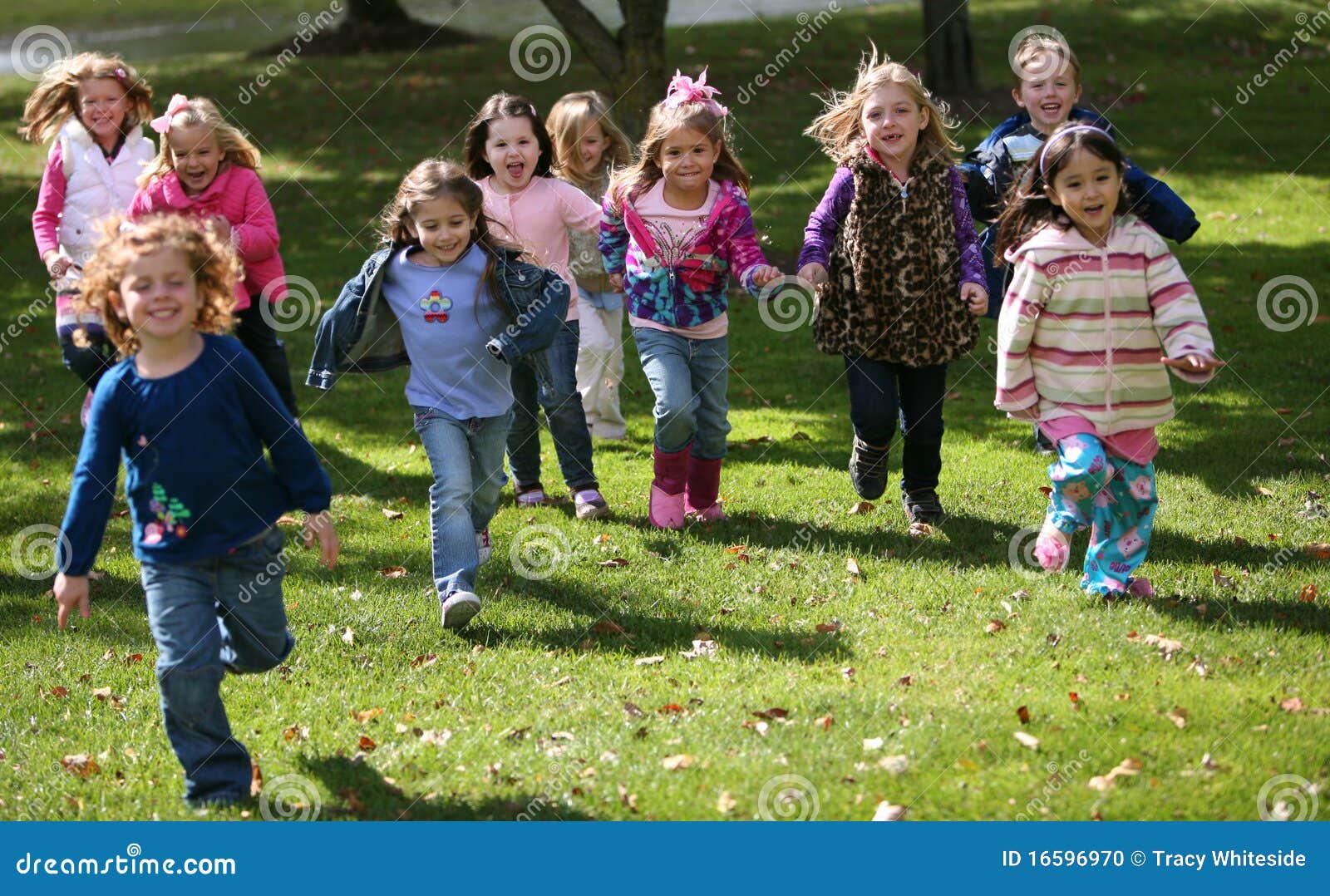 Diverse running kids stock photo. Image of play, group - 16596970