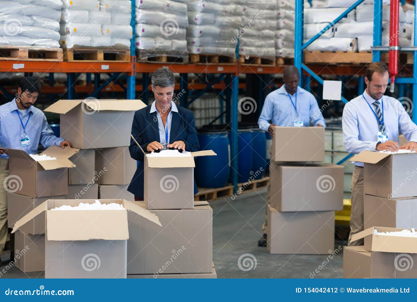Diverse Staff Checking Stocks in Warehouse Stock Photo - Image of young ...