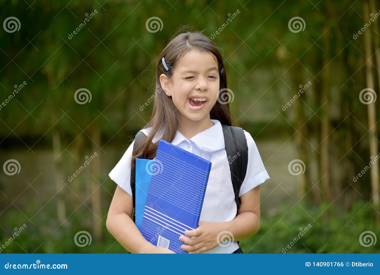 Diverse Student Child Making Funny Faces with Books Stock Photo - Image ...