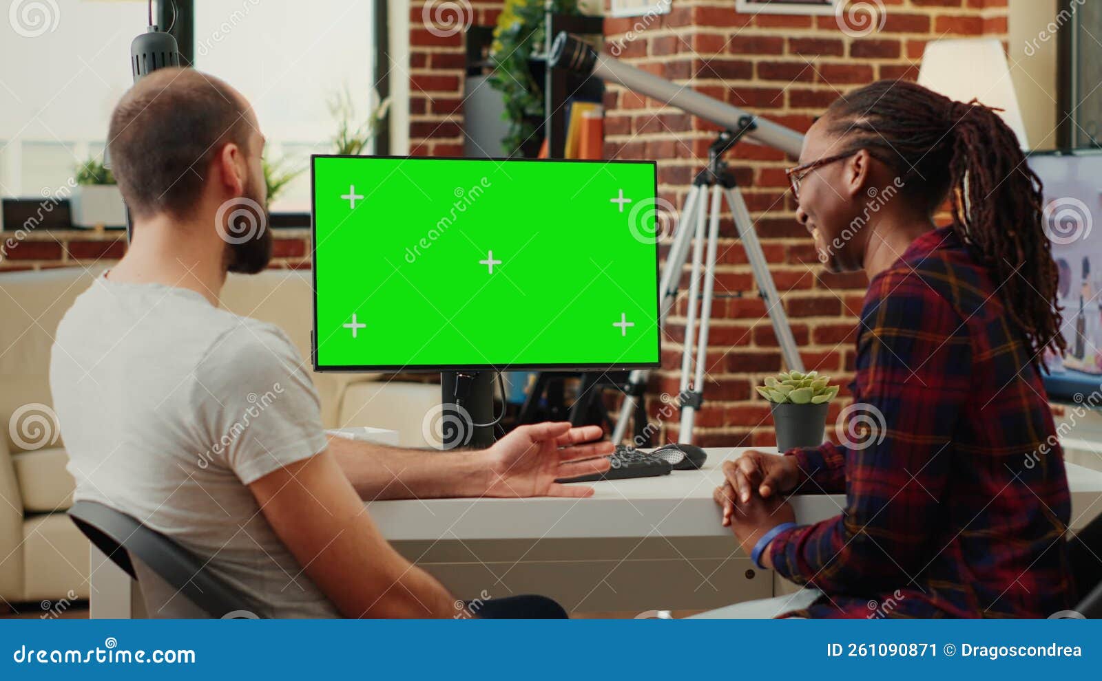 Diverse Team of Colleagues Looking at Computer with Greenscreen Stock ...