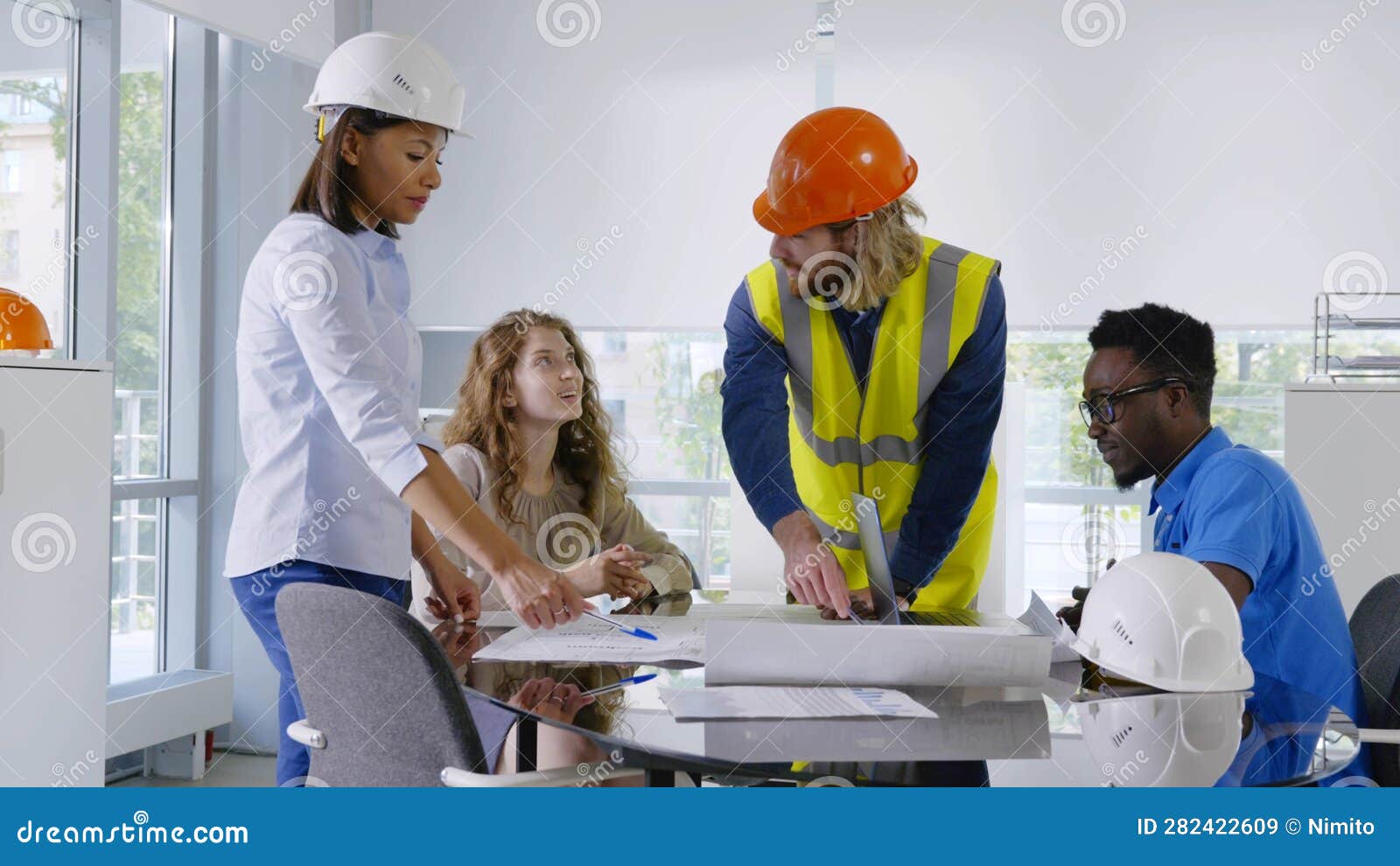 Diverse Team of Engineers and Architects Discussing Construction and ...