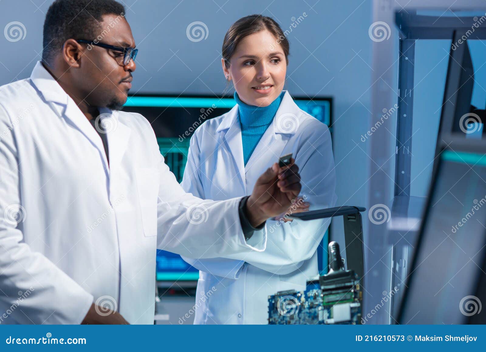 Diverse Team of Microelectronic Engineers Discuss Current Developments ...