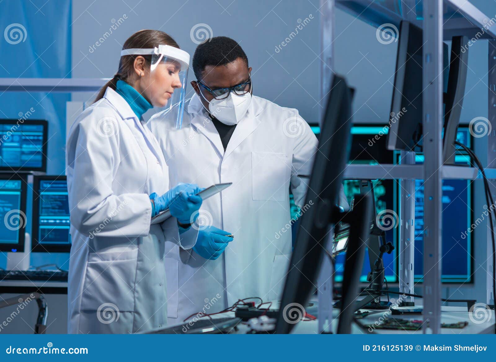 Diverse Team of Microelectronic Engineers Discuss Current Developments ...