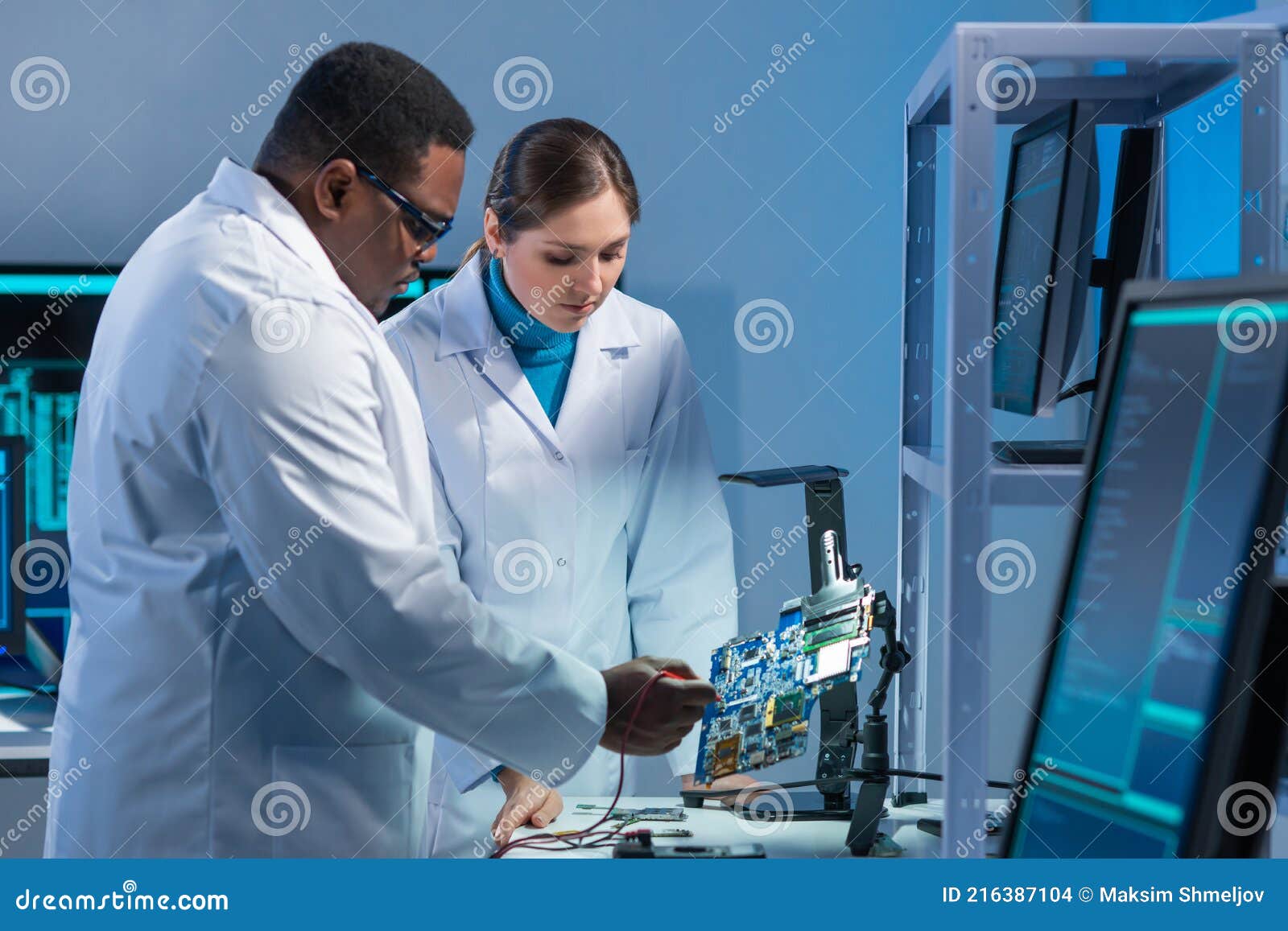 Diverse Team of Microelectronic Engineers Discuss Current Developments ...